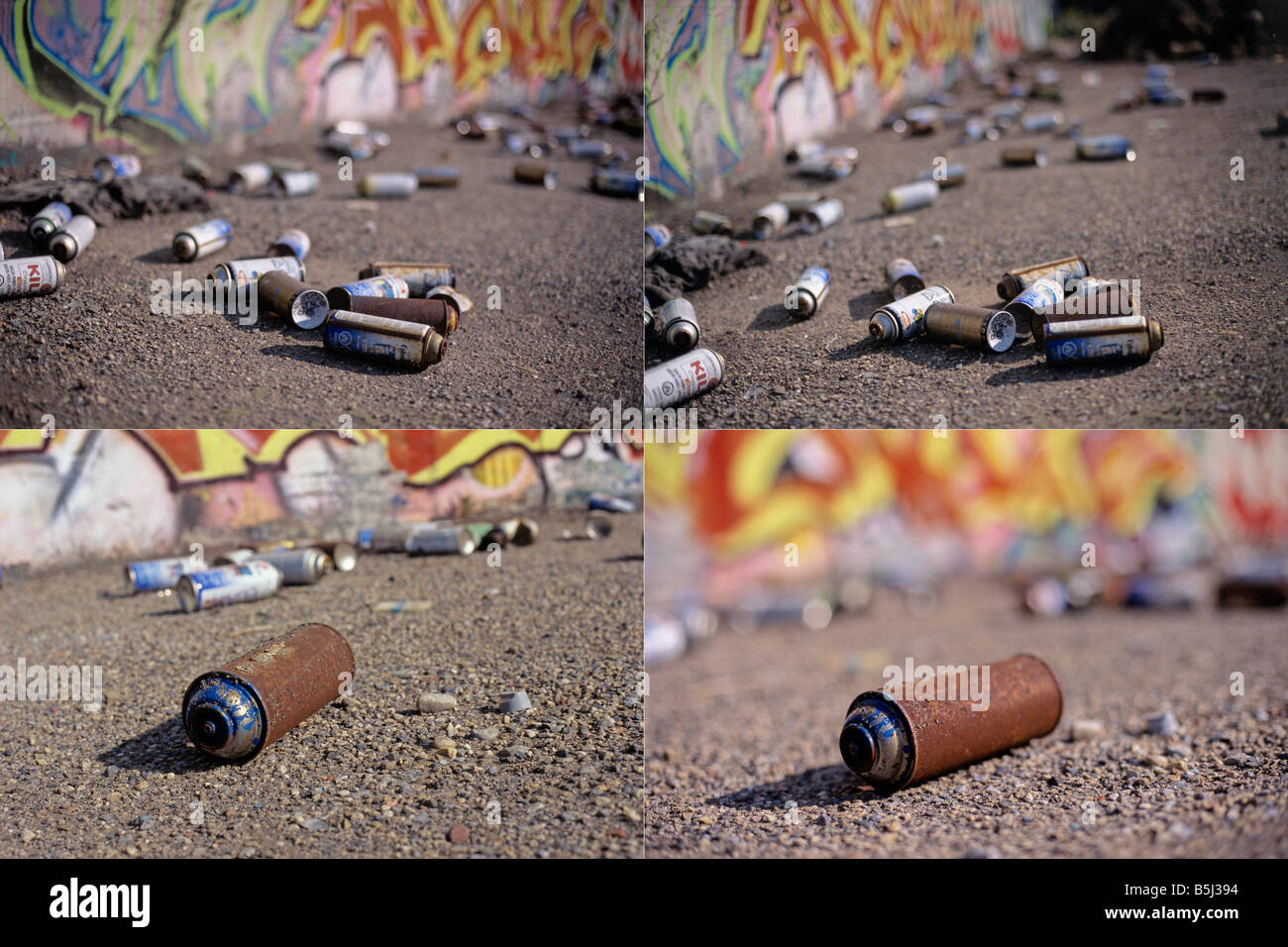 Used spray cans of paint wasted by graffiti artists Stock Photo - Alamy