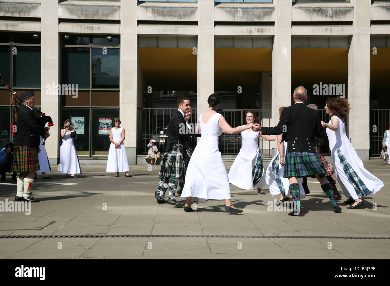Scottish Highland dancers performing in open air in London Stock Photo ...