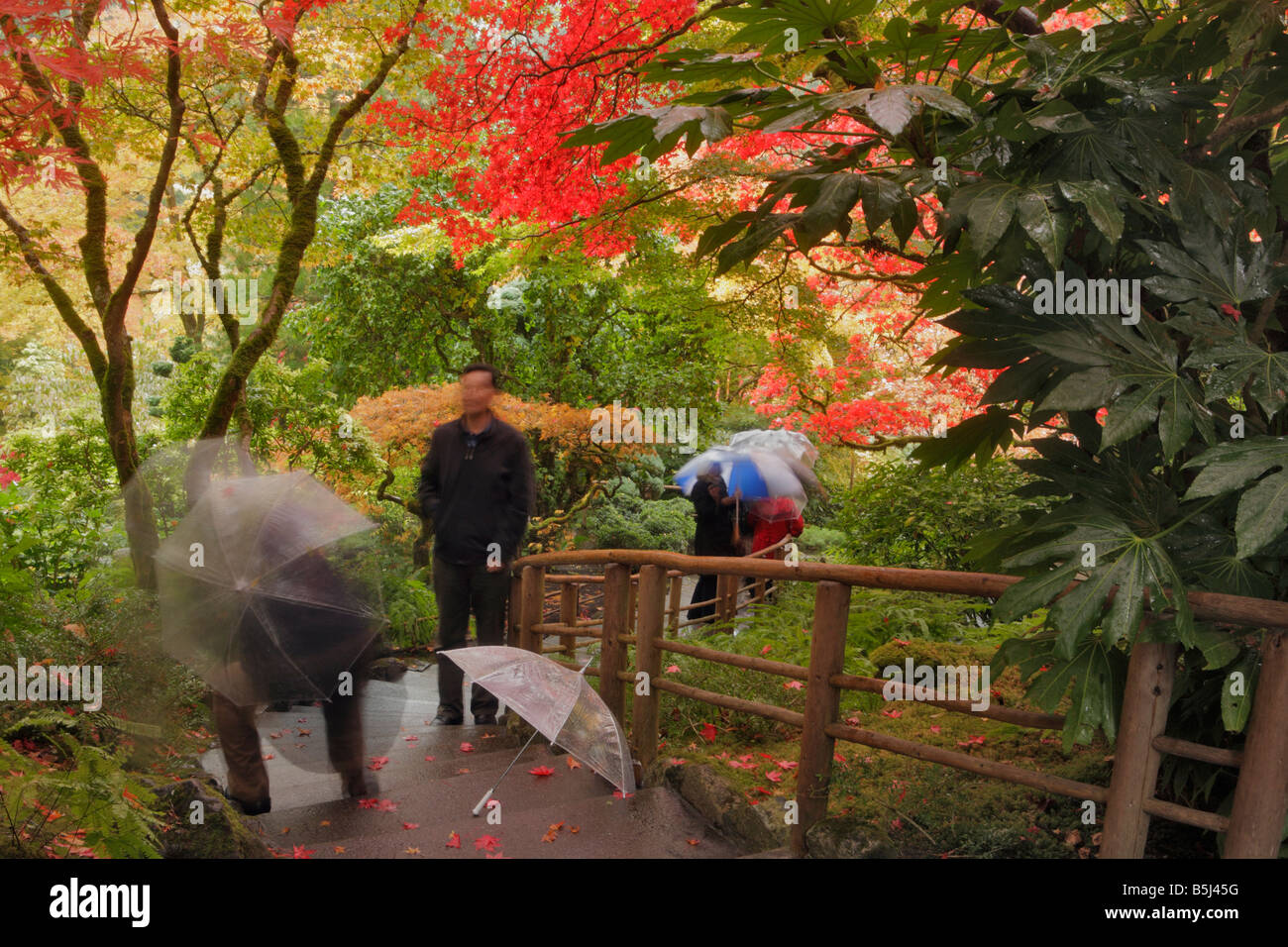 Tourists in Butchart Gardens in autumn Victoria British Columbia Canada ...