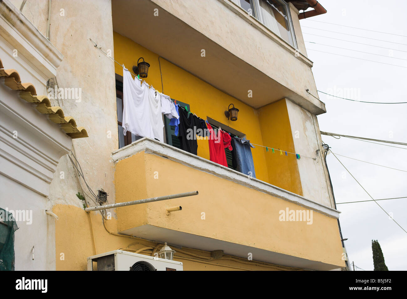 Washing drying on balcony hi-res stock photography and images - Alamy