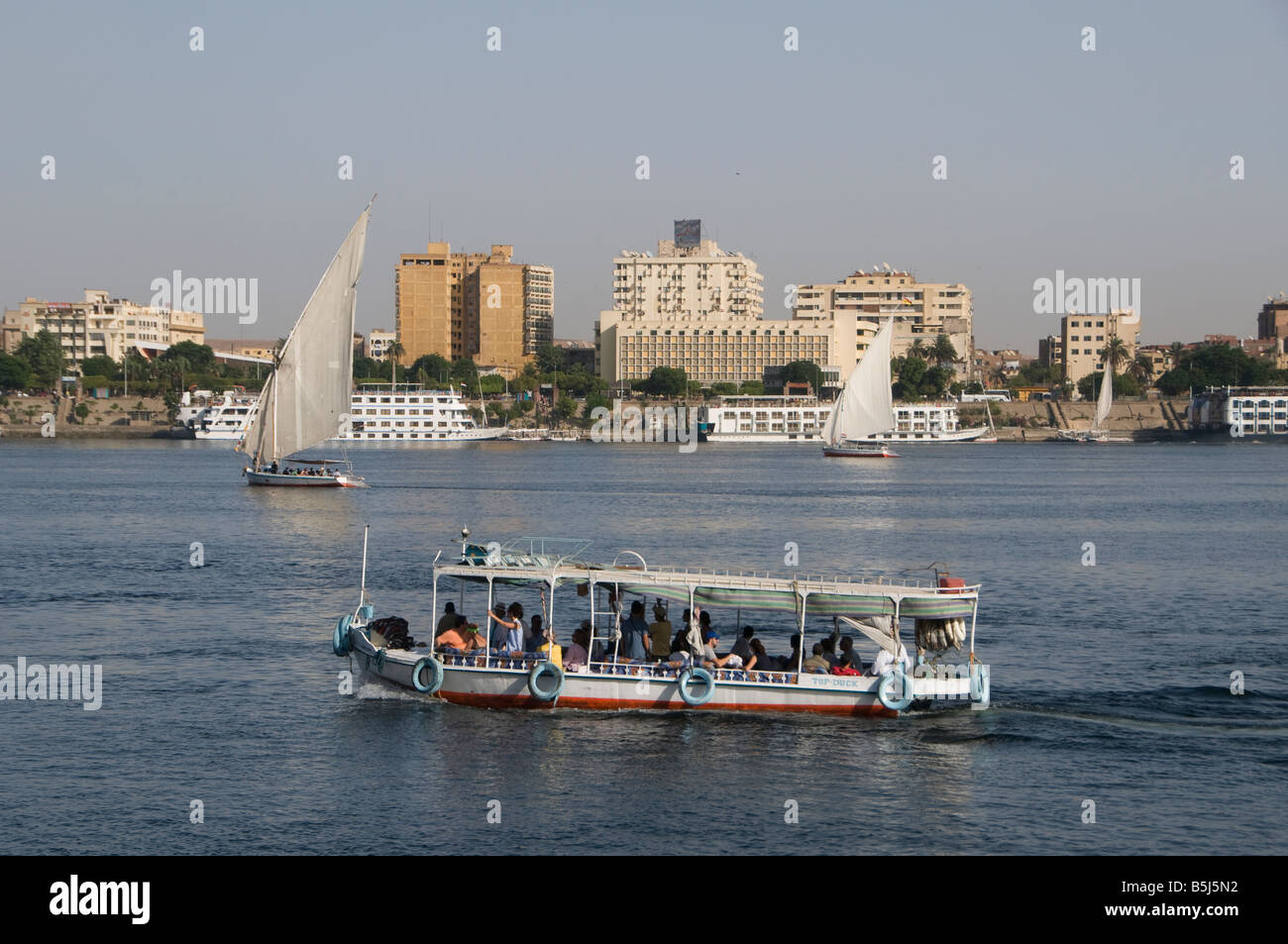 A tour boat boating along the Nile river in Cairo Egypt Stock Photo - Alamy