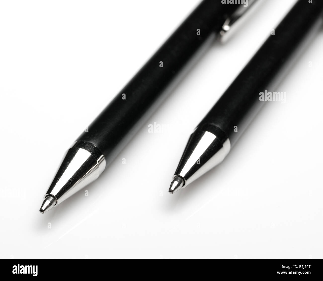 Pen A set of black ball pens on a light background Stock Photo - Alamy