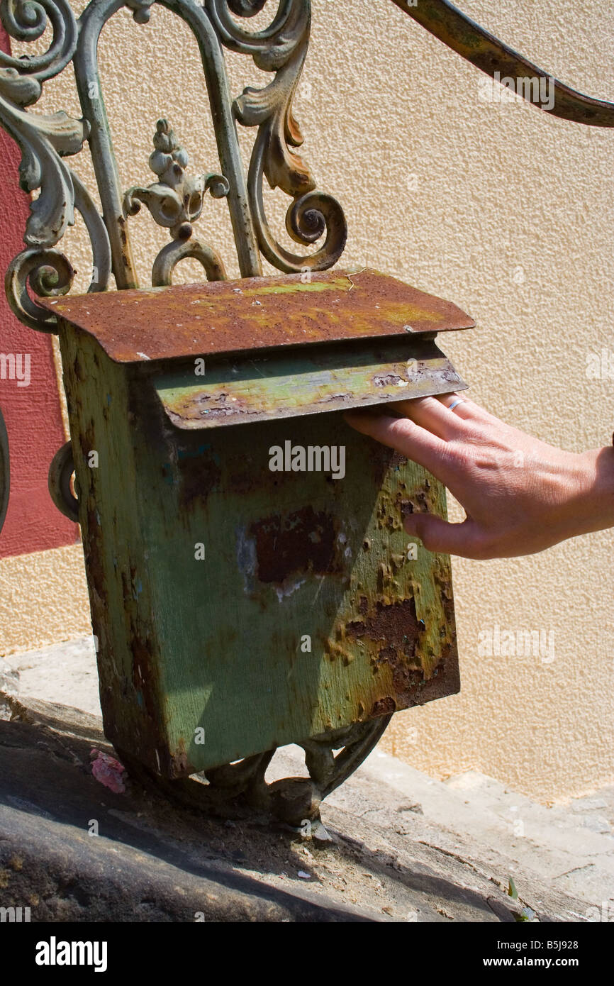 Mailbox letter human hand wall hi-res stock photography and images - Alamy