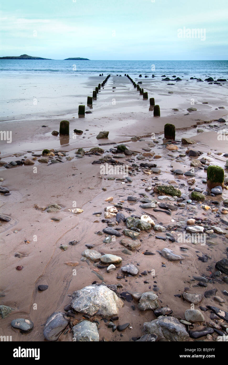PIER aberdaron north wales beach sand stump ruin sea Llŷn Peninsula in ...