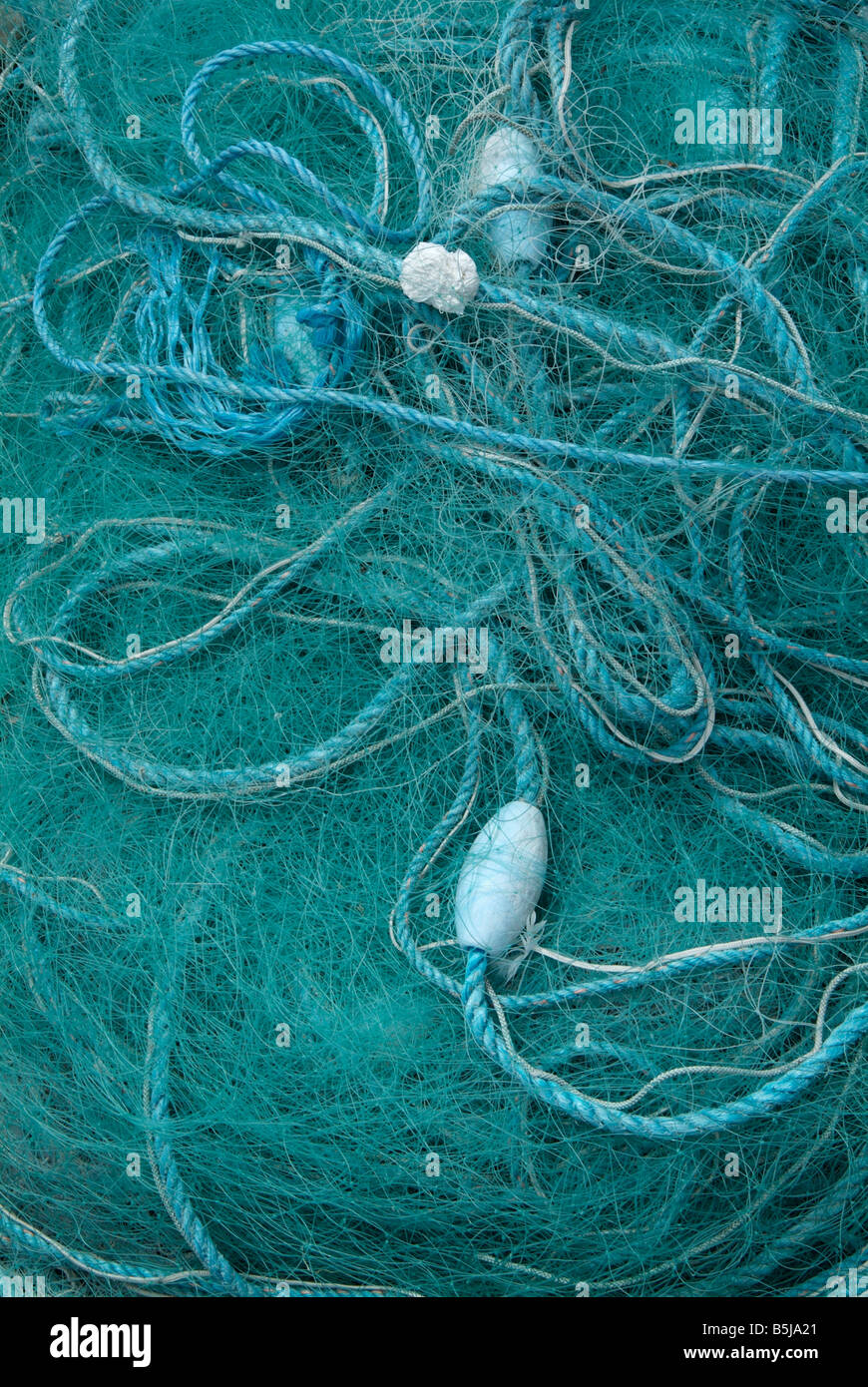 fishing nets harbour quay wall side multicolour Stock Photo - Alamy