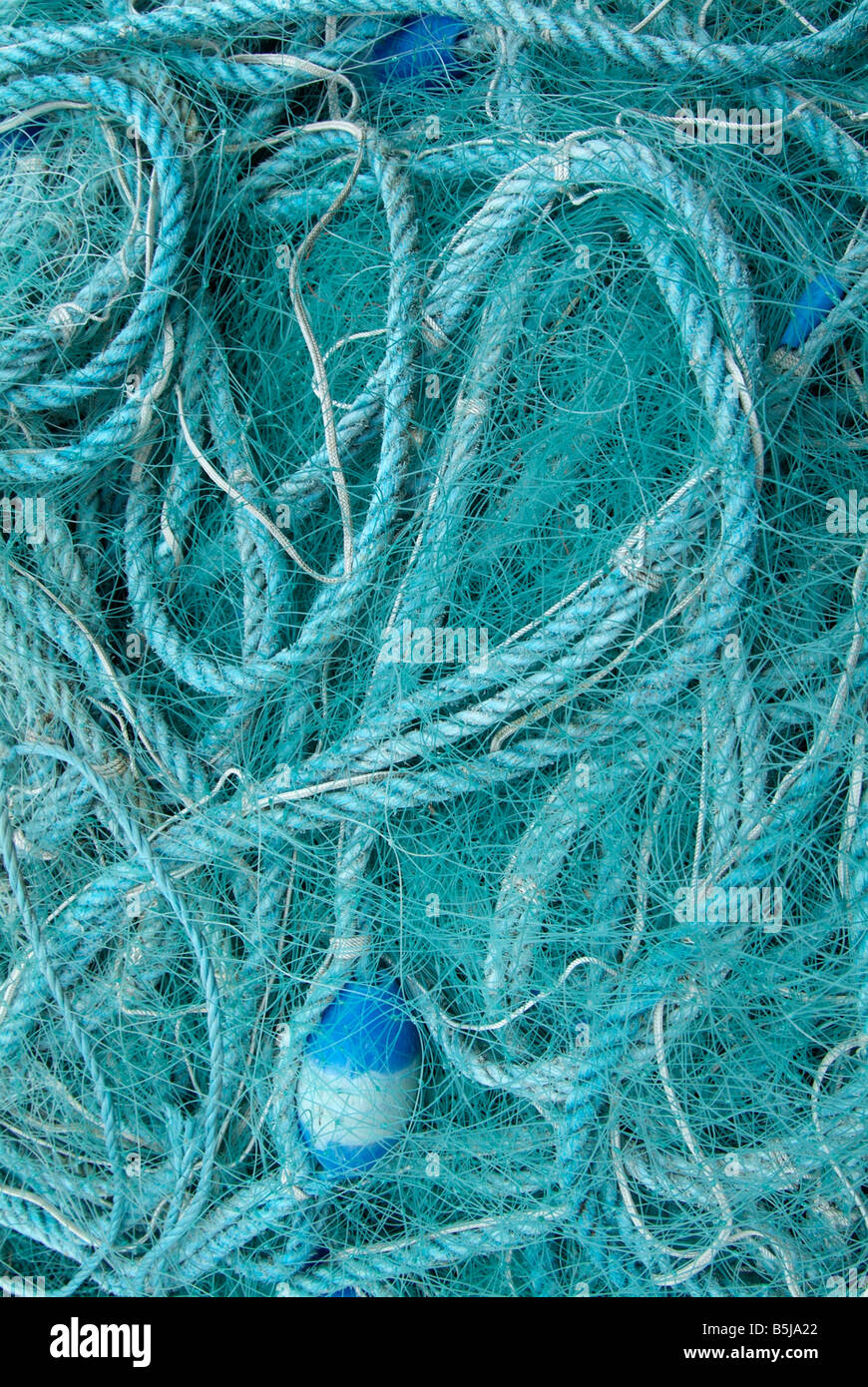 fishing nets harbour quay wall side multicolour Stock Photo - Alamy