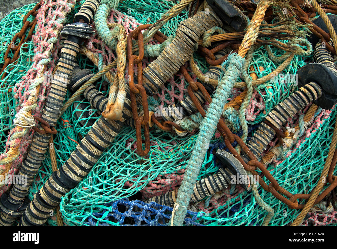 fishing nets harbour quay wall side multicolour Stock Photo - Alamy