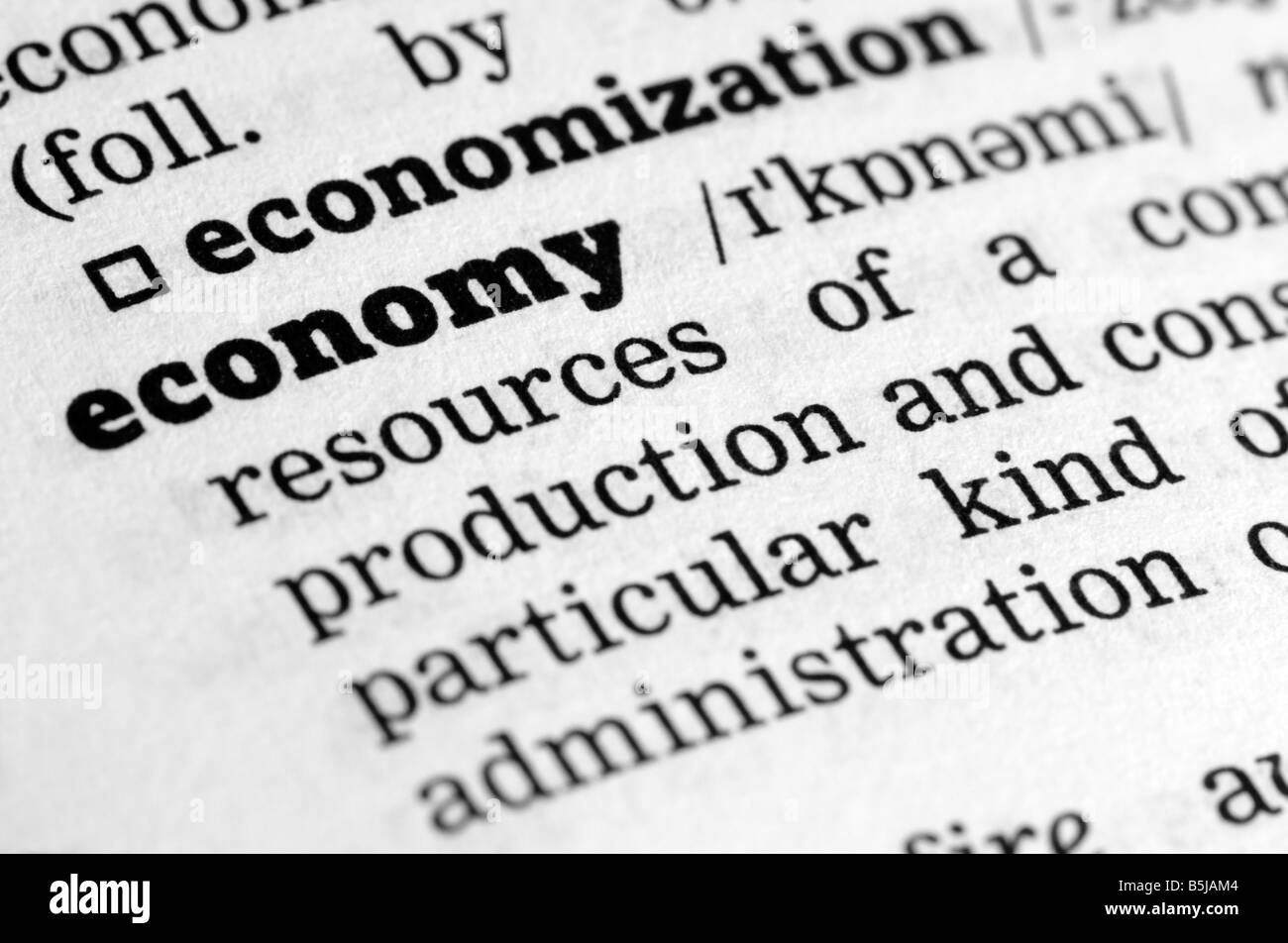 Macro shot of economy dictionary definition Stock Photo - Alamy