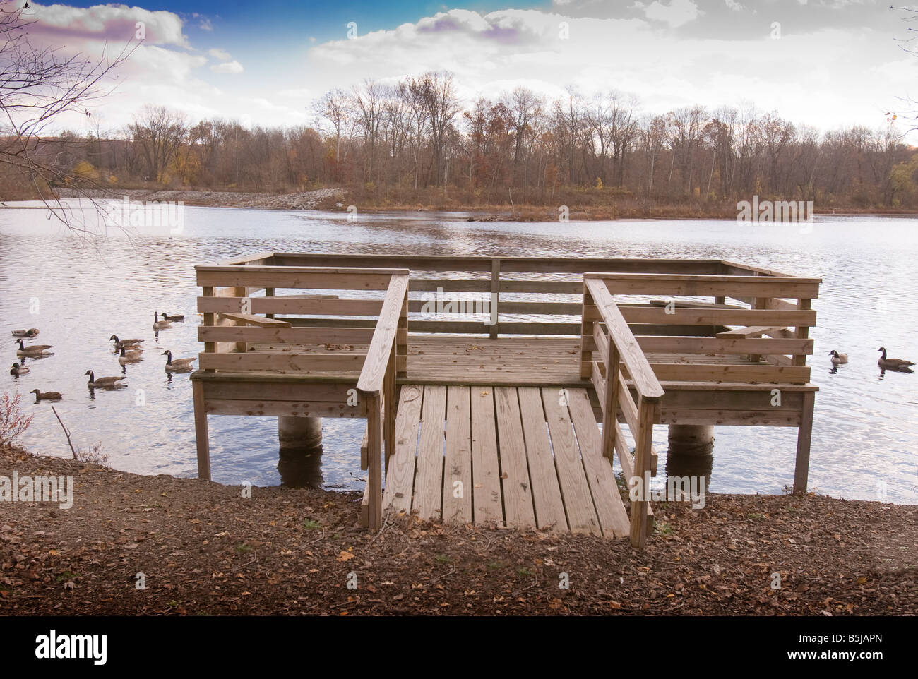 Dock on a fall day Stock Photo - Alamy