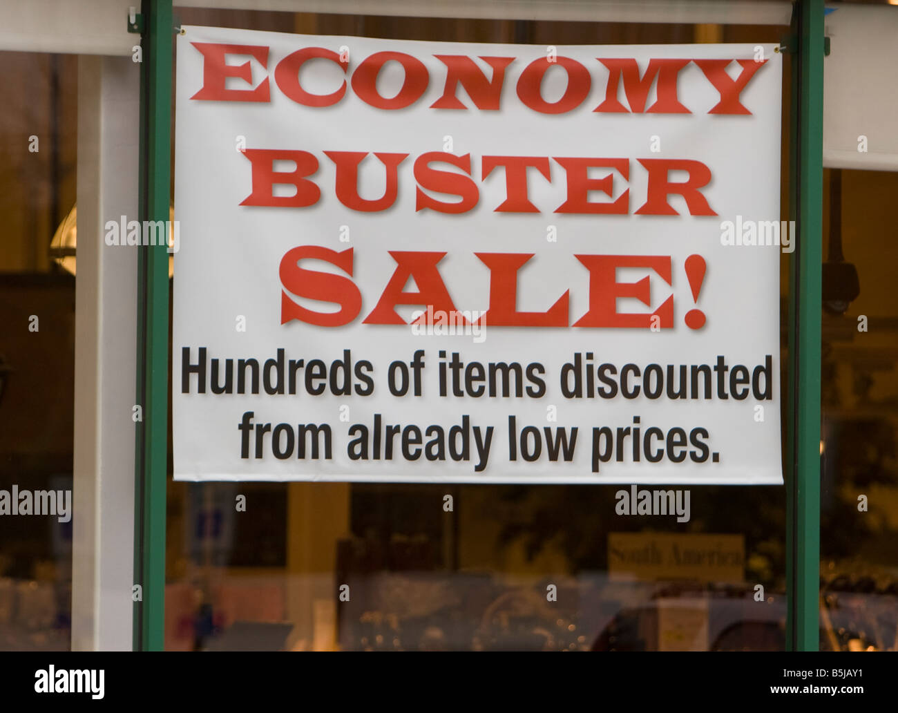 Sale sign in a store window Stock Photo - Alamy
