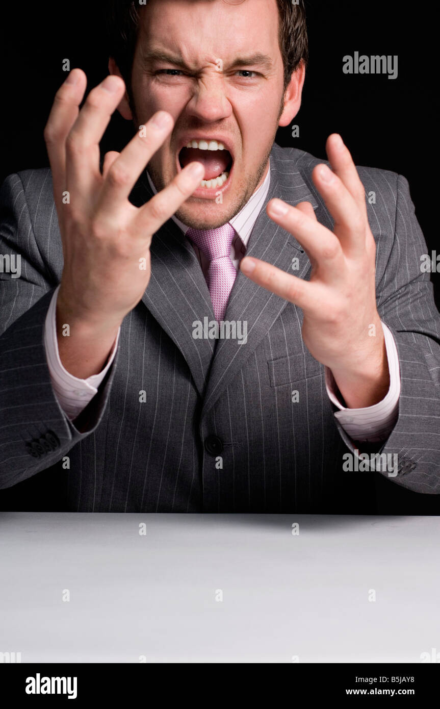 portrait of angry businessman Stock Photo - Alamy