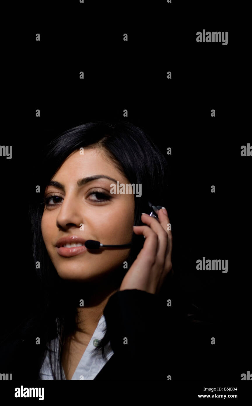 Woman wearing headset hi-res stock photography and images - Alamy