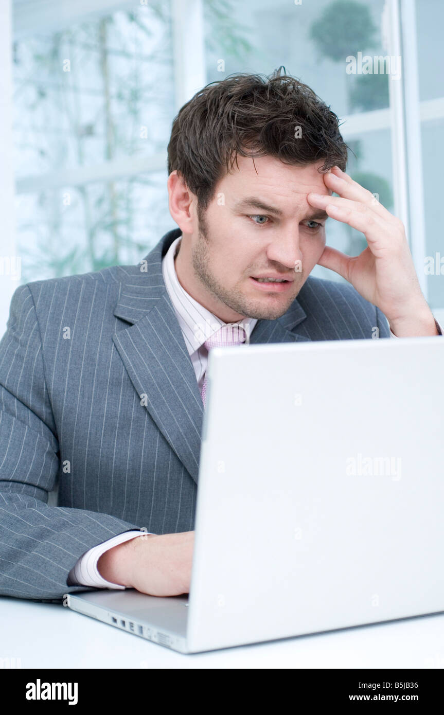 Man employee laptop desperate hi-res stock photography and images - Alamy