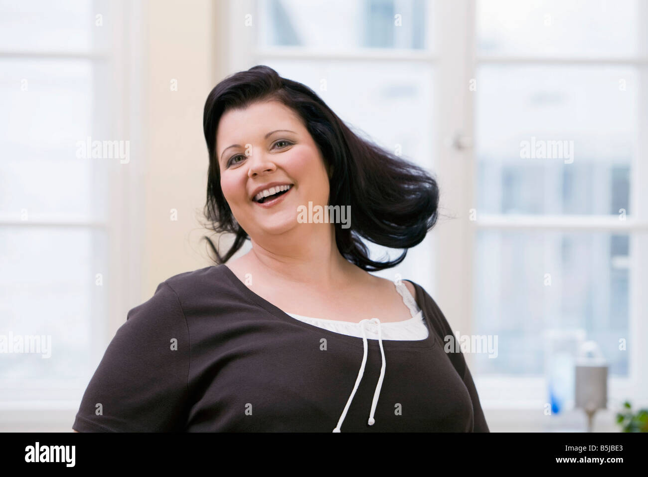 portrait of smiling overweight woman Stock Photo - Alamy