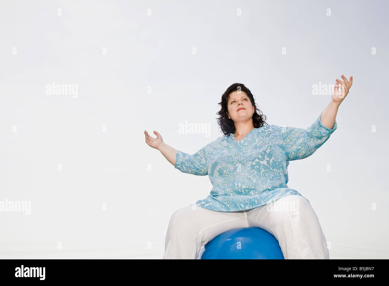 Fat woman blue ball hi-res stock photography and images - Alamy