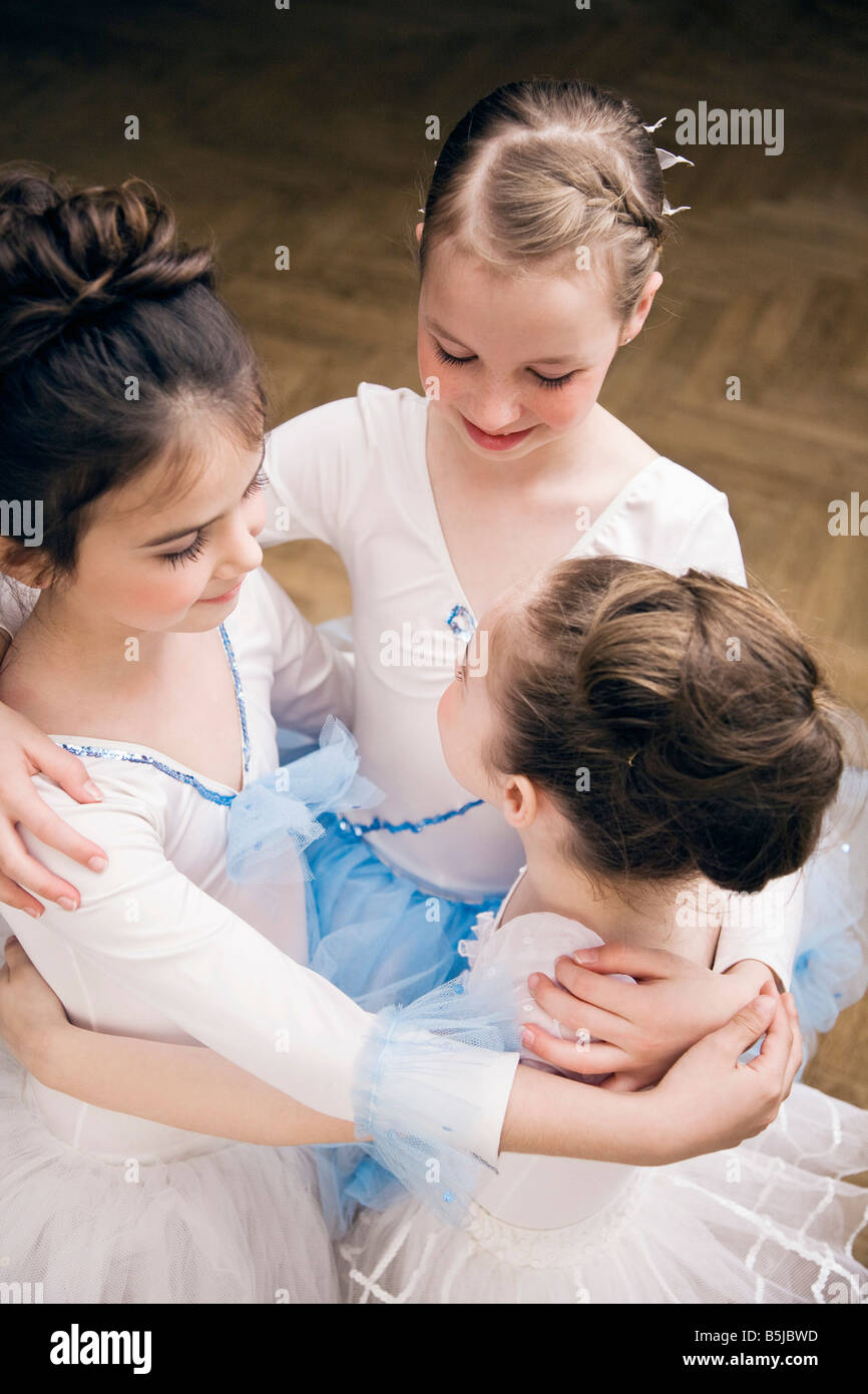 group of three young ballet dancers in close embrace Stock Photo - Alamy