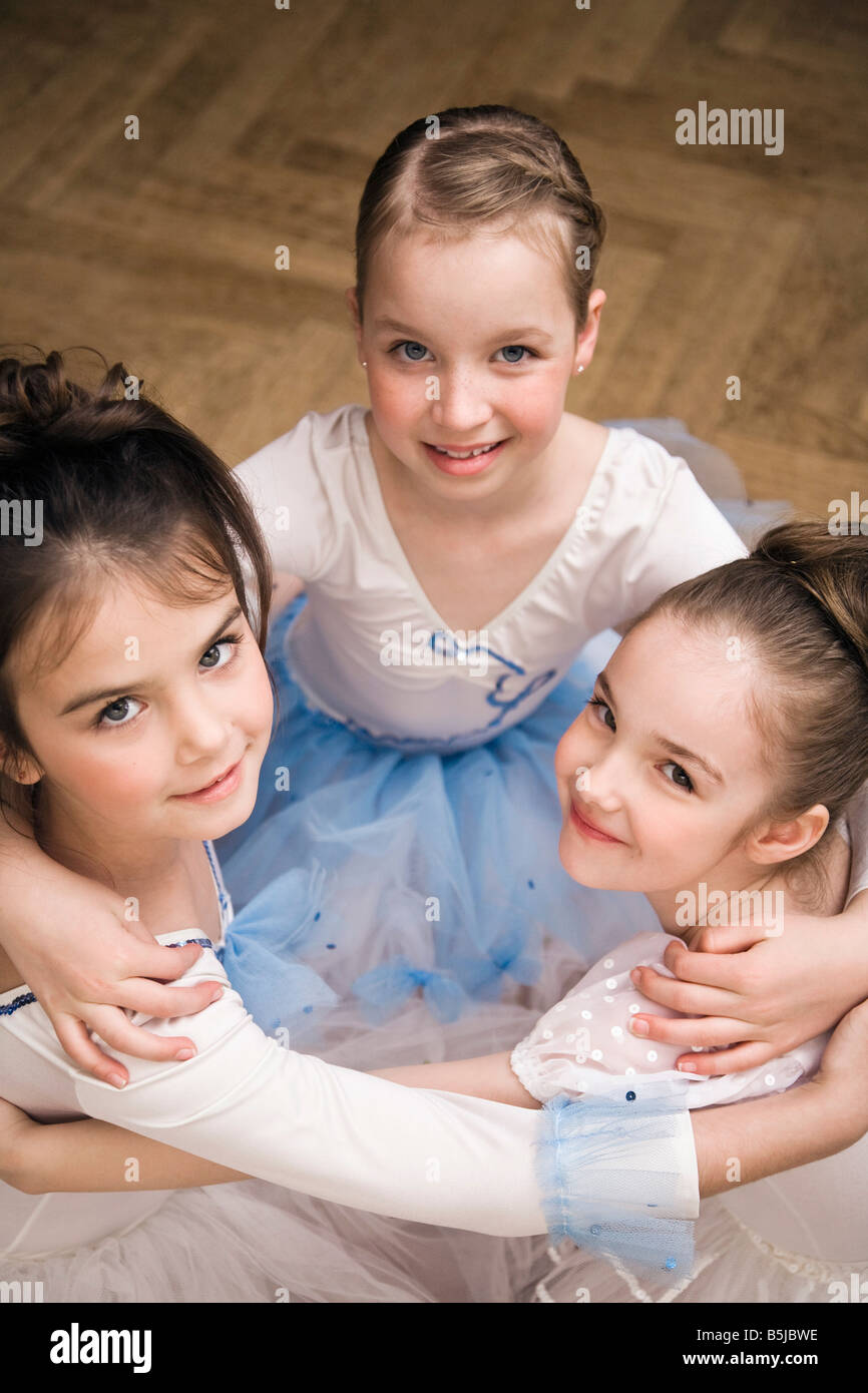 group of three young ballet dancers in close embrace Stock Photo - Alamy