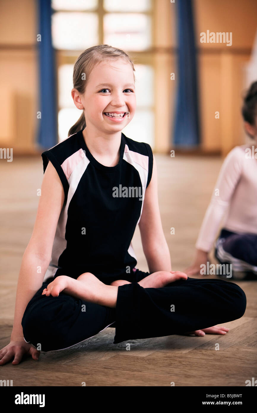 Blonde girl doing exercise vertical hi-res stock photography and images ...