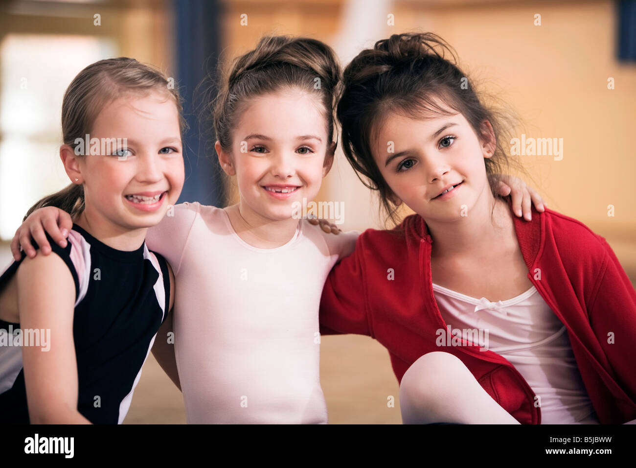 group of three young ballet dancers in close embrace Stock Photo - Alamy
