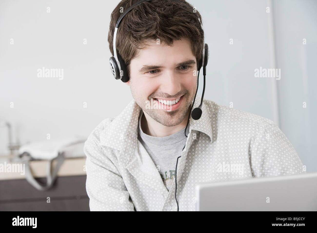 portrait of man wearing headset Stock Photo - Alamy