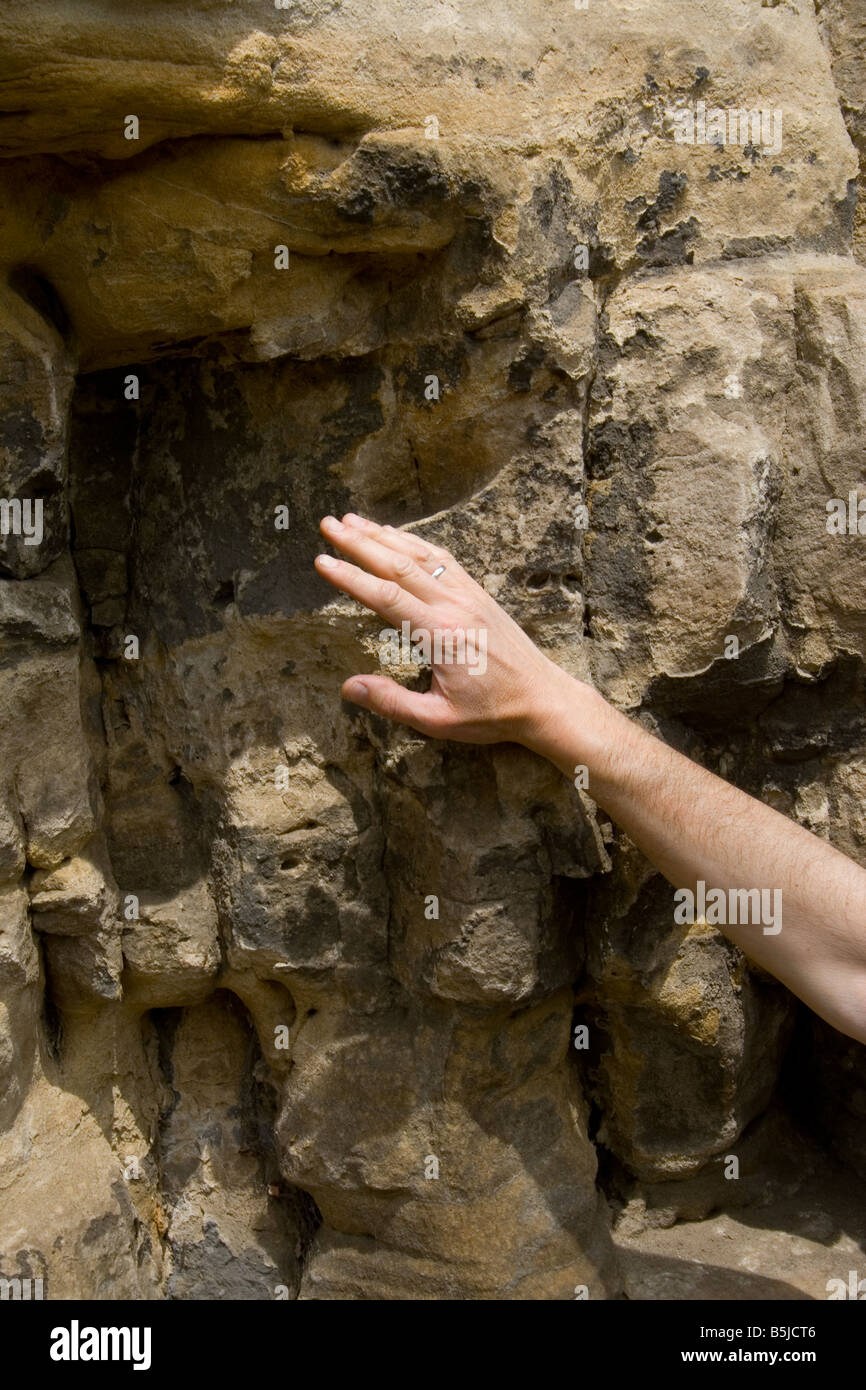 Hand reaching for the wall Luxembourg 2006 Stock Photo - Alamy