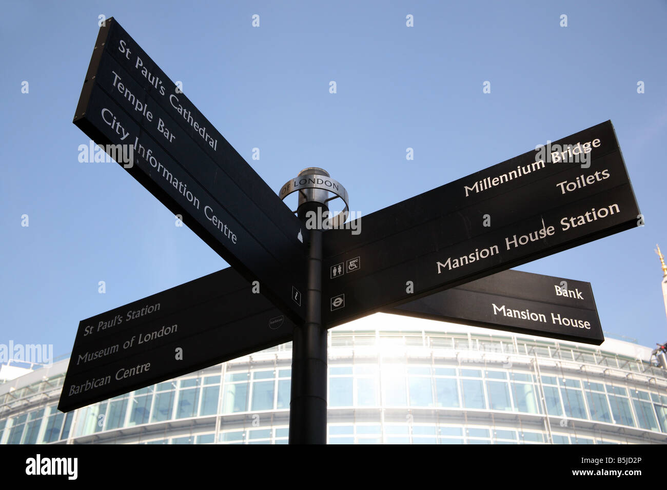 Pedestrian direction sign in City of London Stock Photo - Alamy