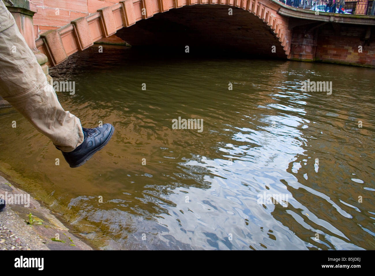 Stepping over hi-res stock photography and images - Alamy