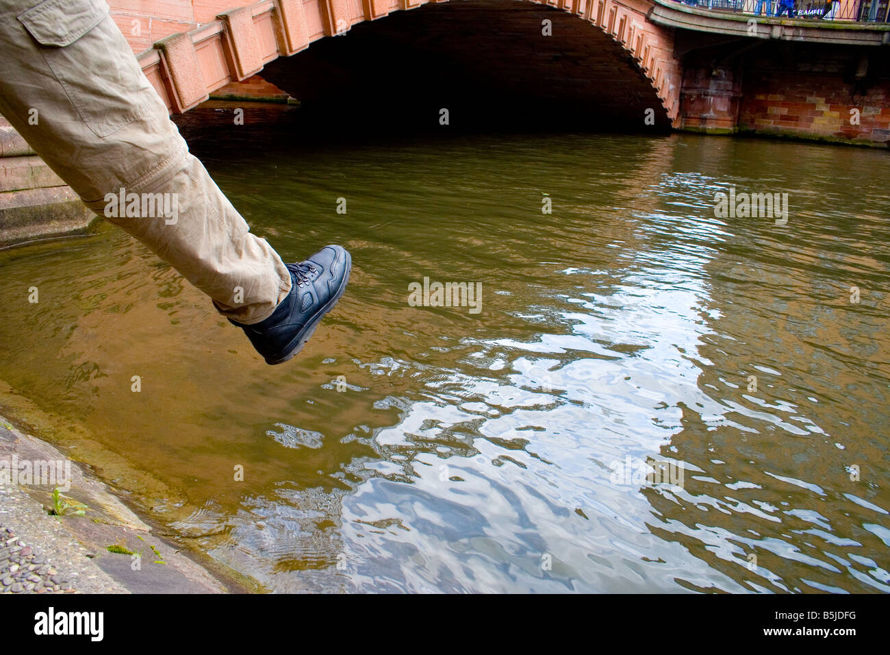 Stepping over hi-res stock photography and images - Alamy