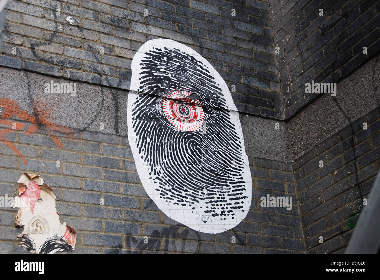 Shoreditch, London . Street art - giant fingerprint and eye ...