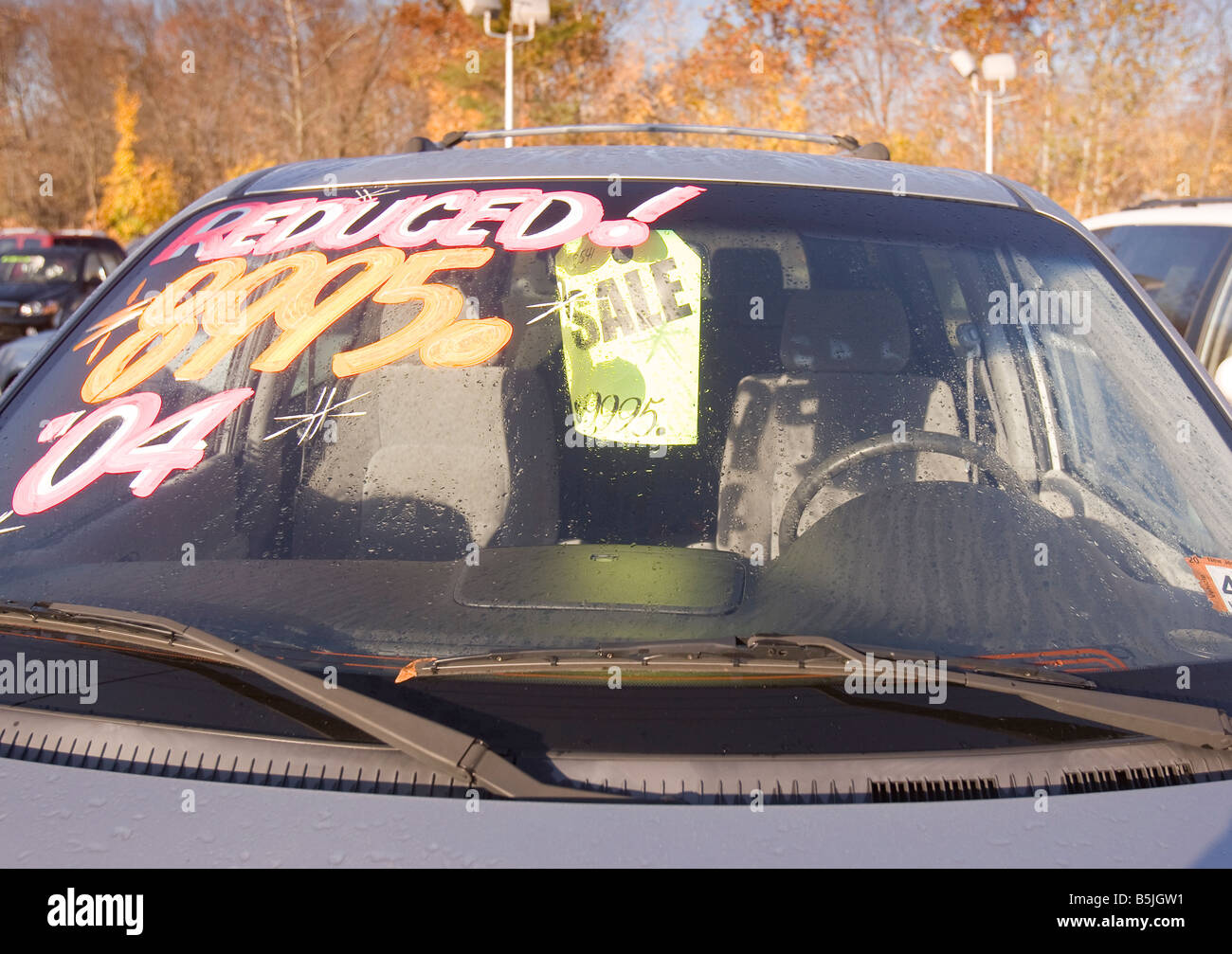 Reduced price on a used car Stock Photo - Alamy