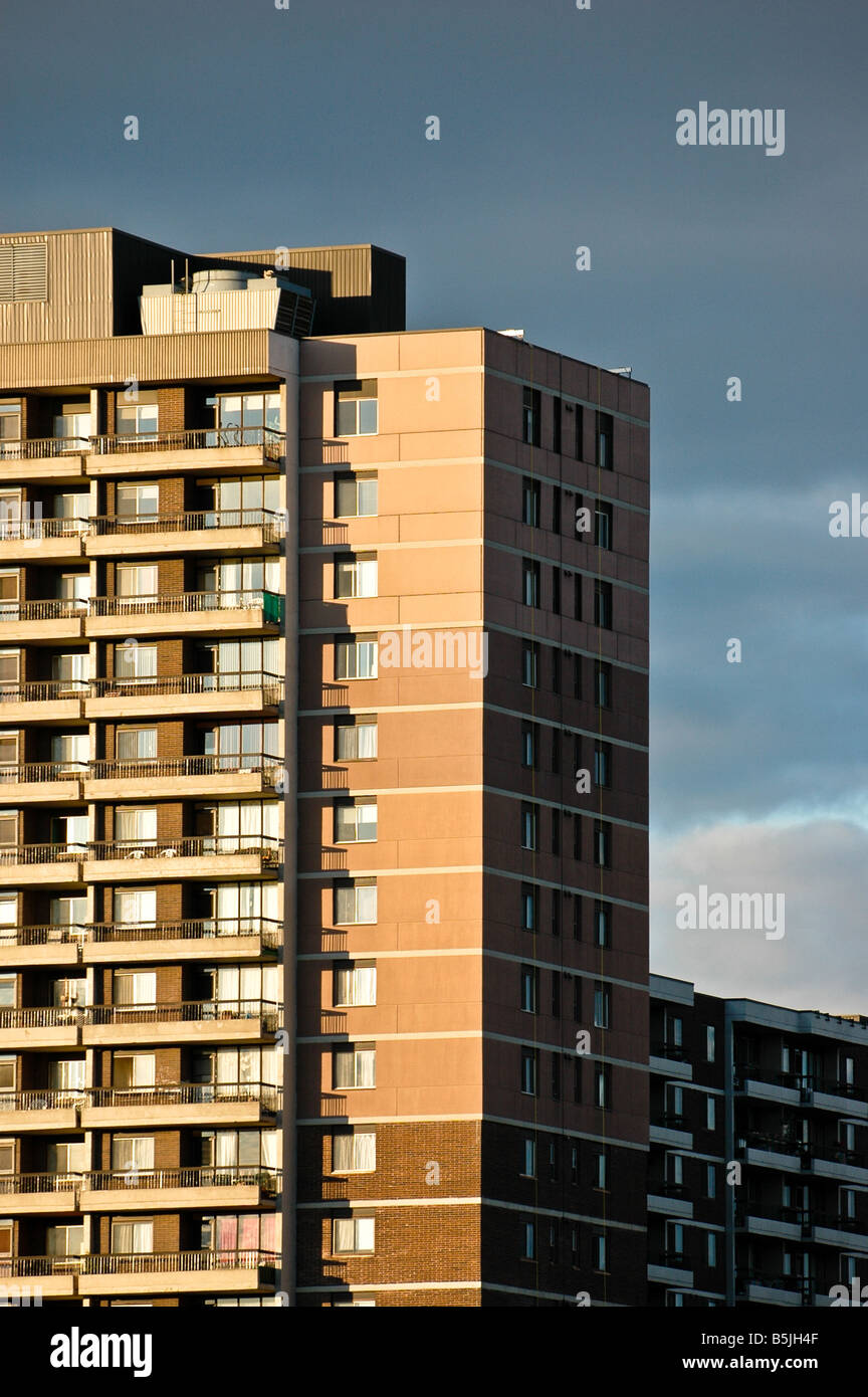 Residential apartment buildings highlighted by the setting sun Stock ...