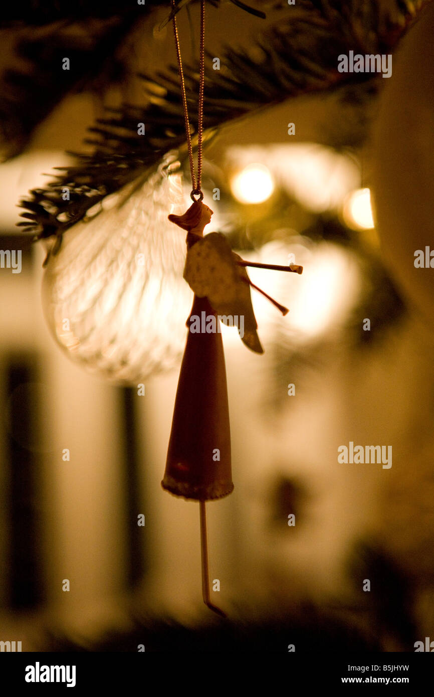 angel christmas decoration hanging from tree Stock Photo - Alamy