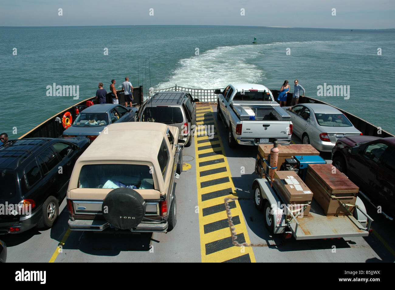 A ferry transporting vehicles and passengers Stock Photo - Alamy