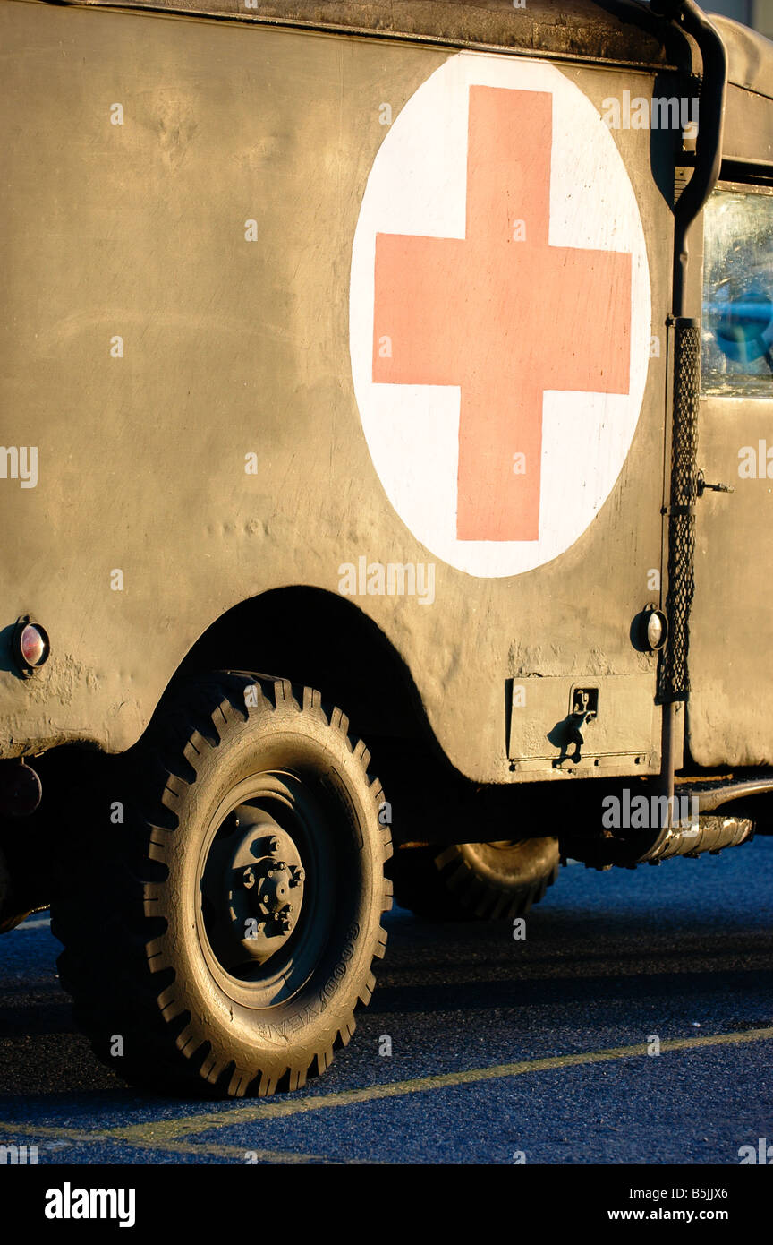 The symbolic red cross on side of a historic military jeep Stock Photo ...