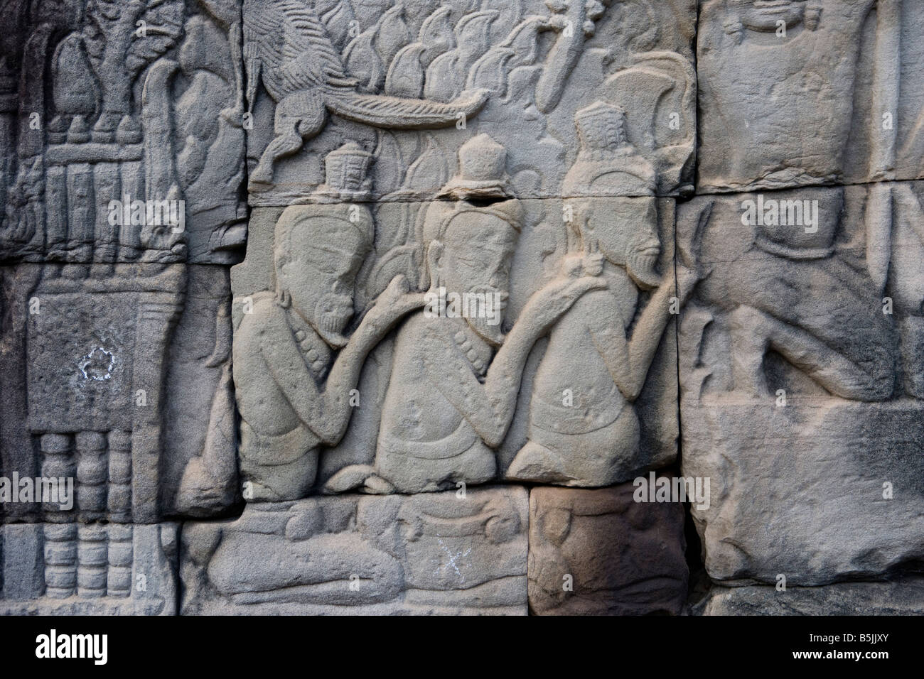 Detail of the intricate ornate carvings on the walls of Bayon temple ...