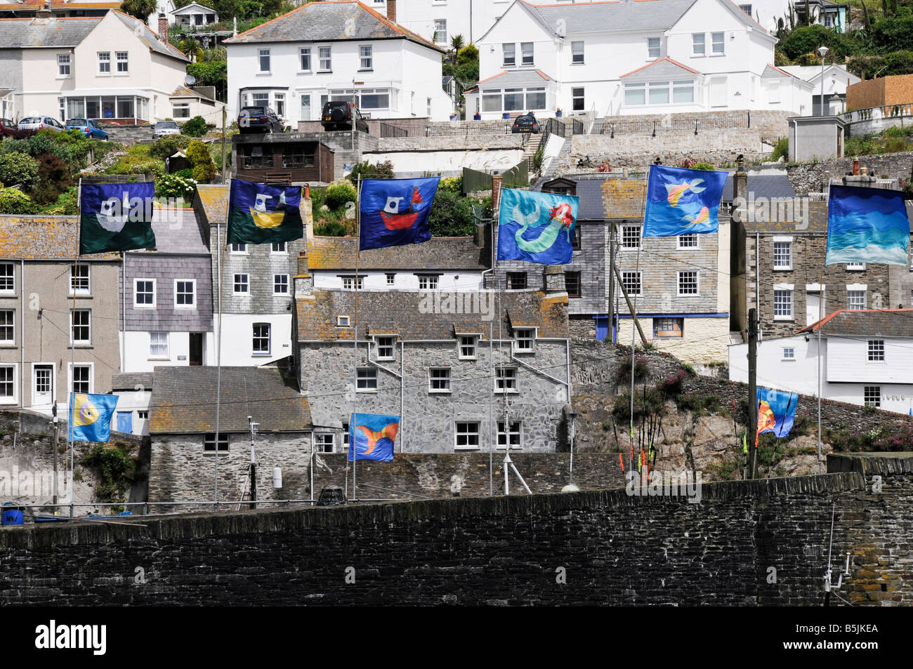 Colourful flags celebrating the Feast Week Festival on the harbourside ...