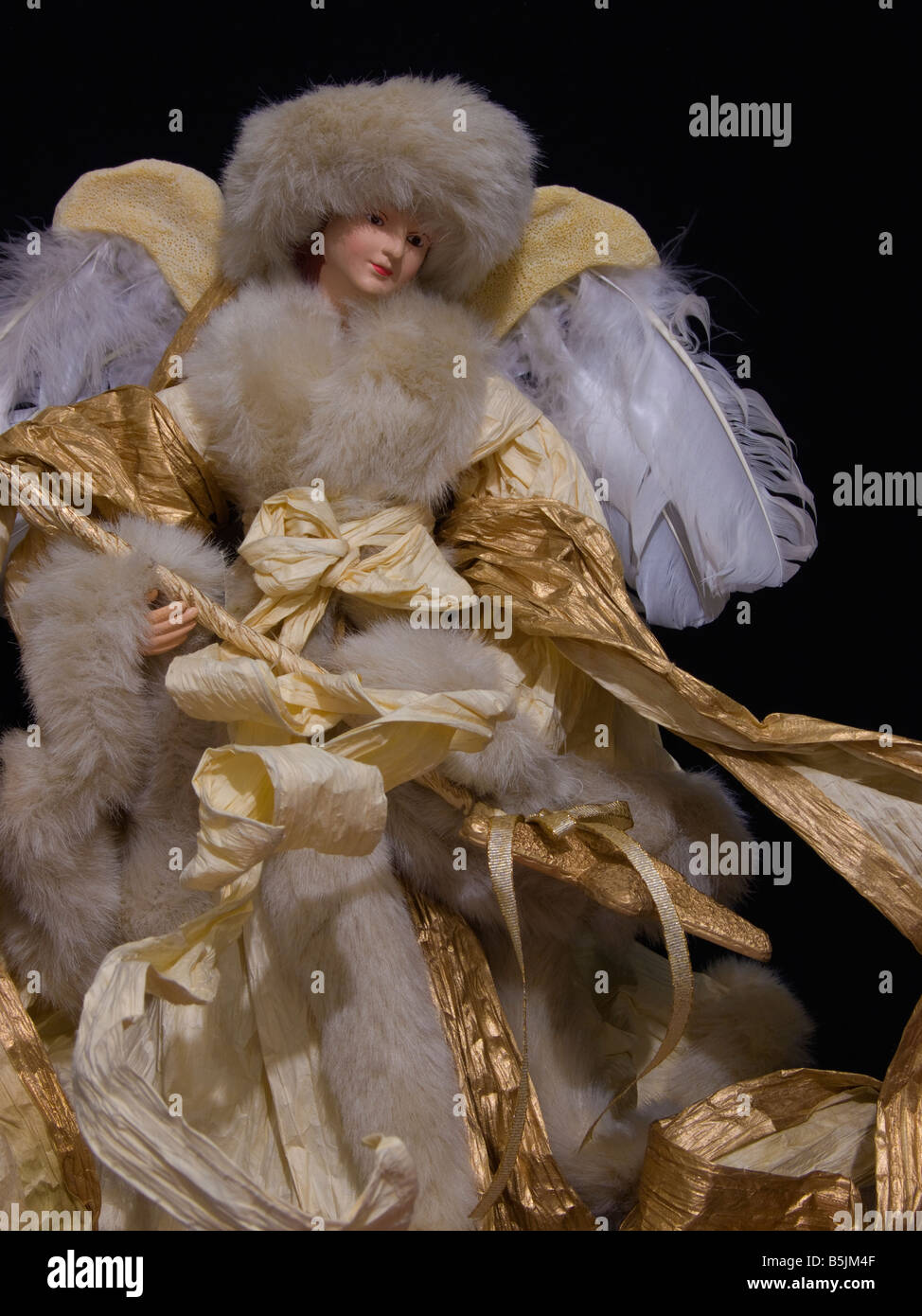 Golden robed Christmas angel (female Stock Photo - Alamy
