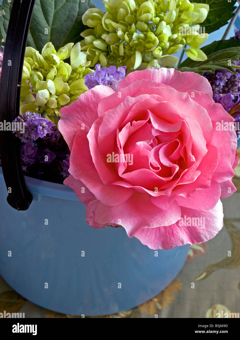 Bucket with flowers hi-res stock photography and images - Alamy