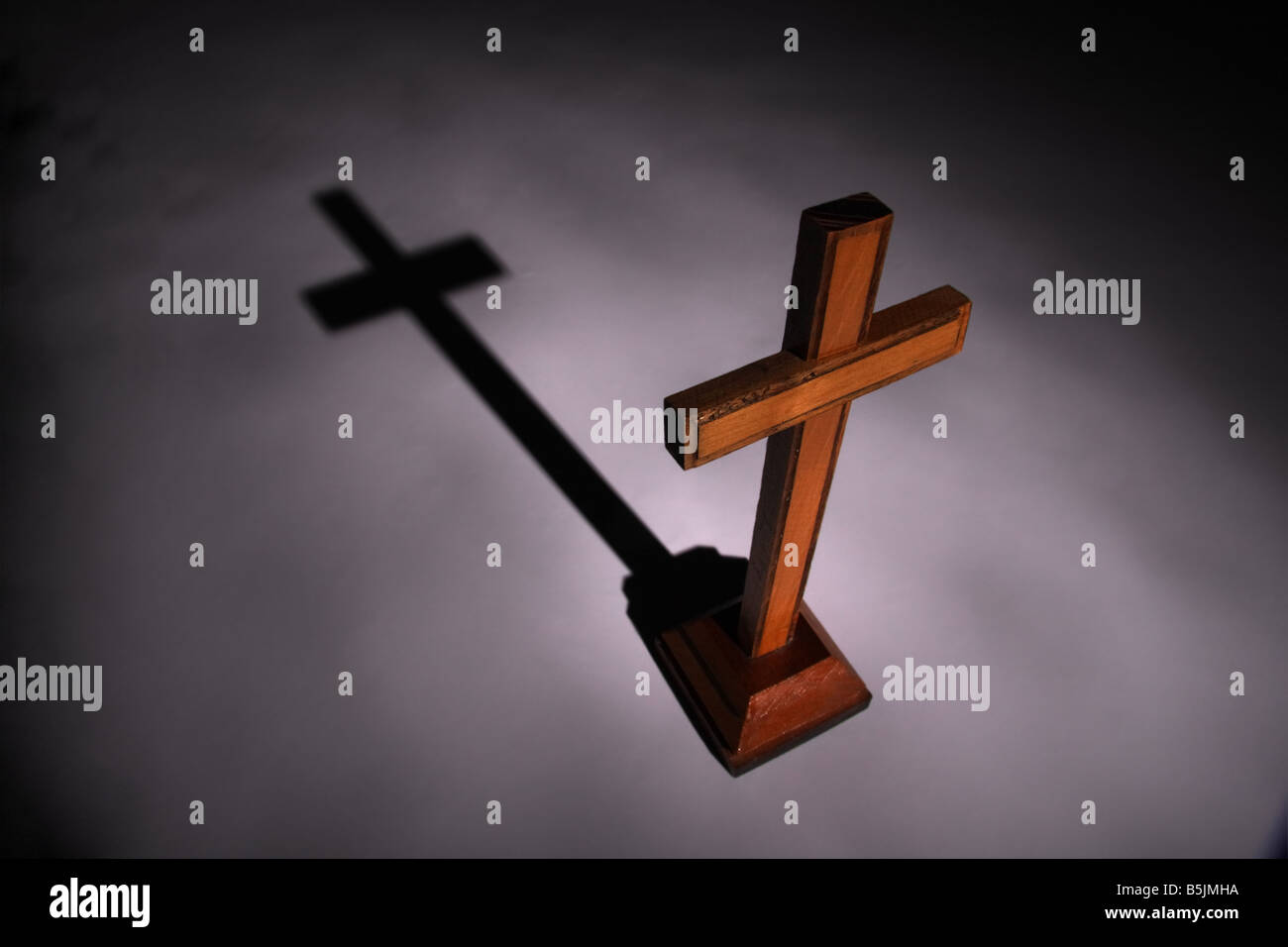 Religious cross and shadow hi-res stock photography and images - Alamy