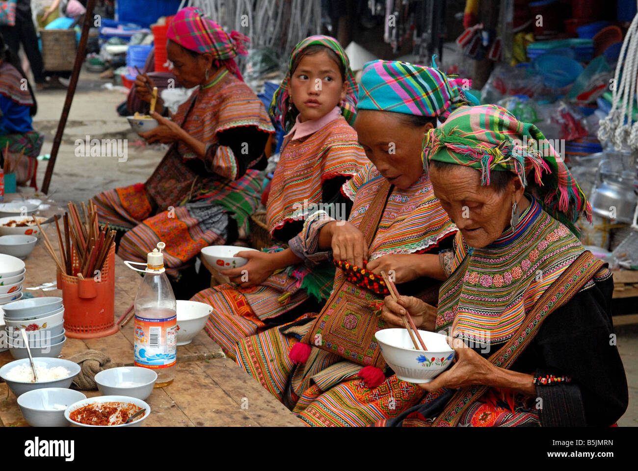 Flower Hmong eating at a stall Bac Ha village in Northern Vietnam Stock ...