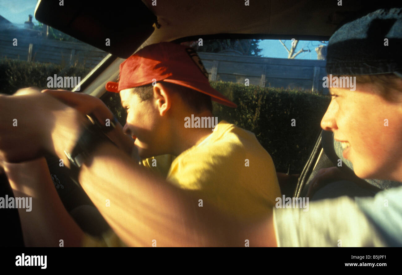 teenagers joy riding car Stock Photo - Alamy