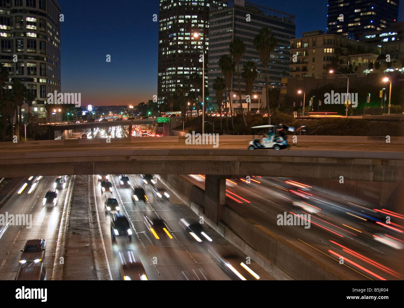 US 101, Harbor Freeway LA skyline, Dusk Los Angeles, California, USA ...