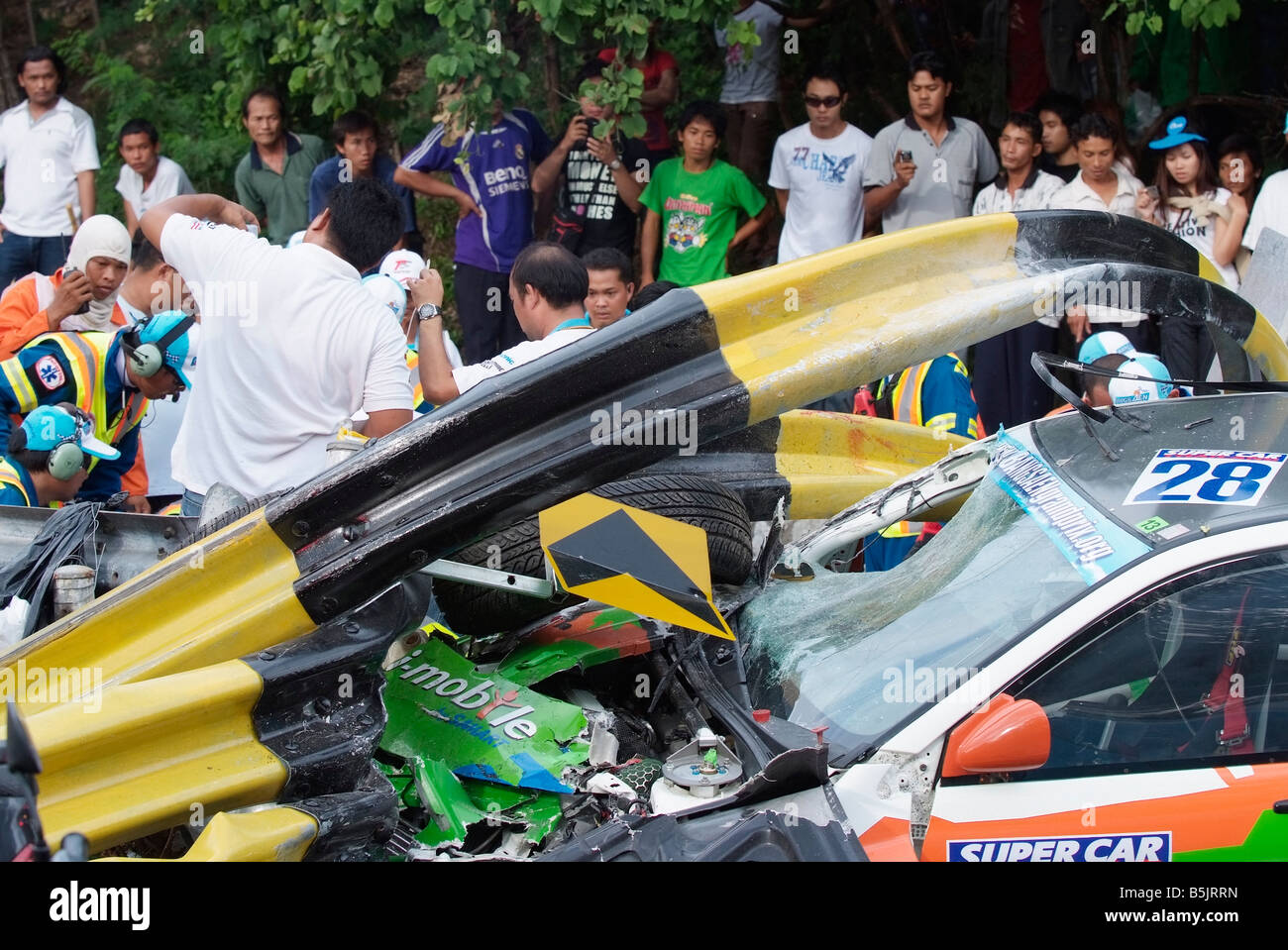 Serious accident involving a racing car that has crashed into a barrier ...
