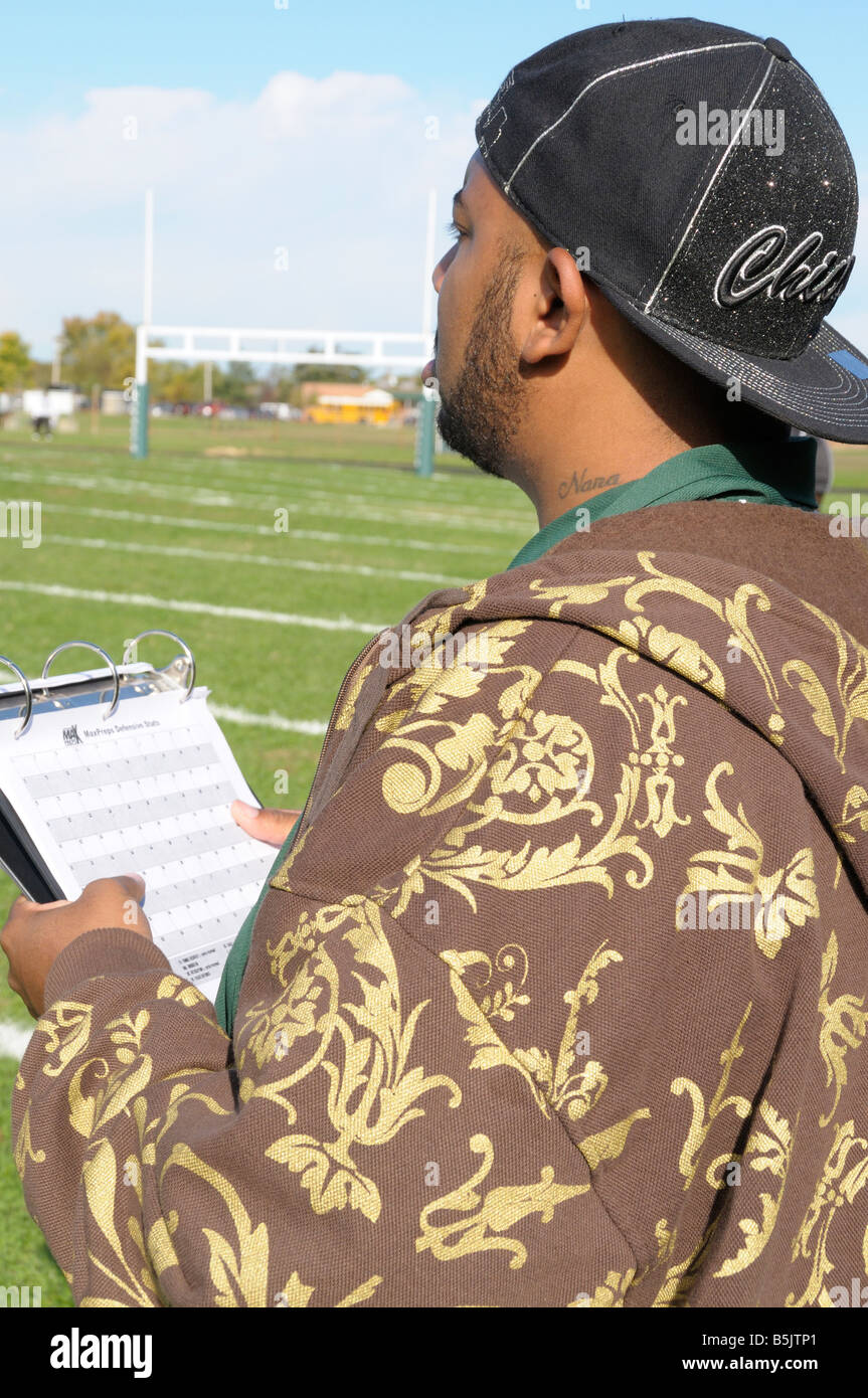 High school football coach watches hi-res stock photography and images ...