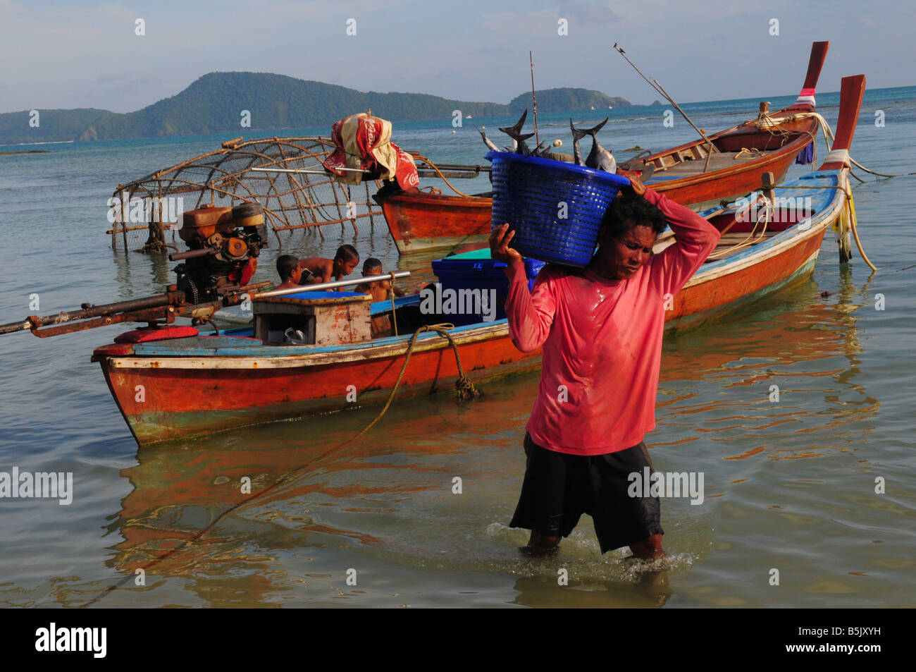 Fisherman carrying fishes home,Rawai beach,Phuket,Thailand Stock Photo ...