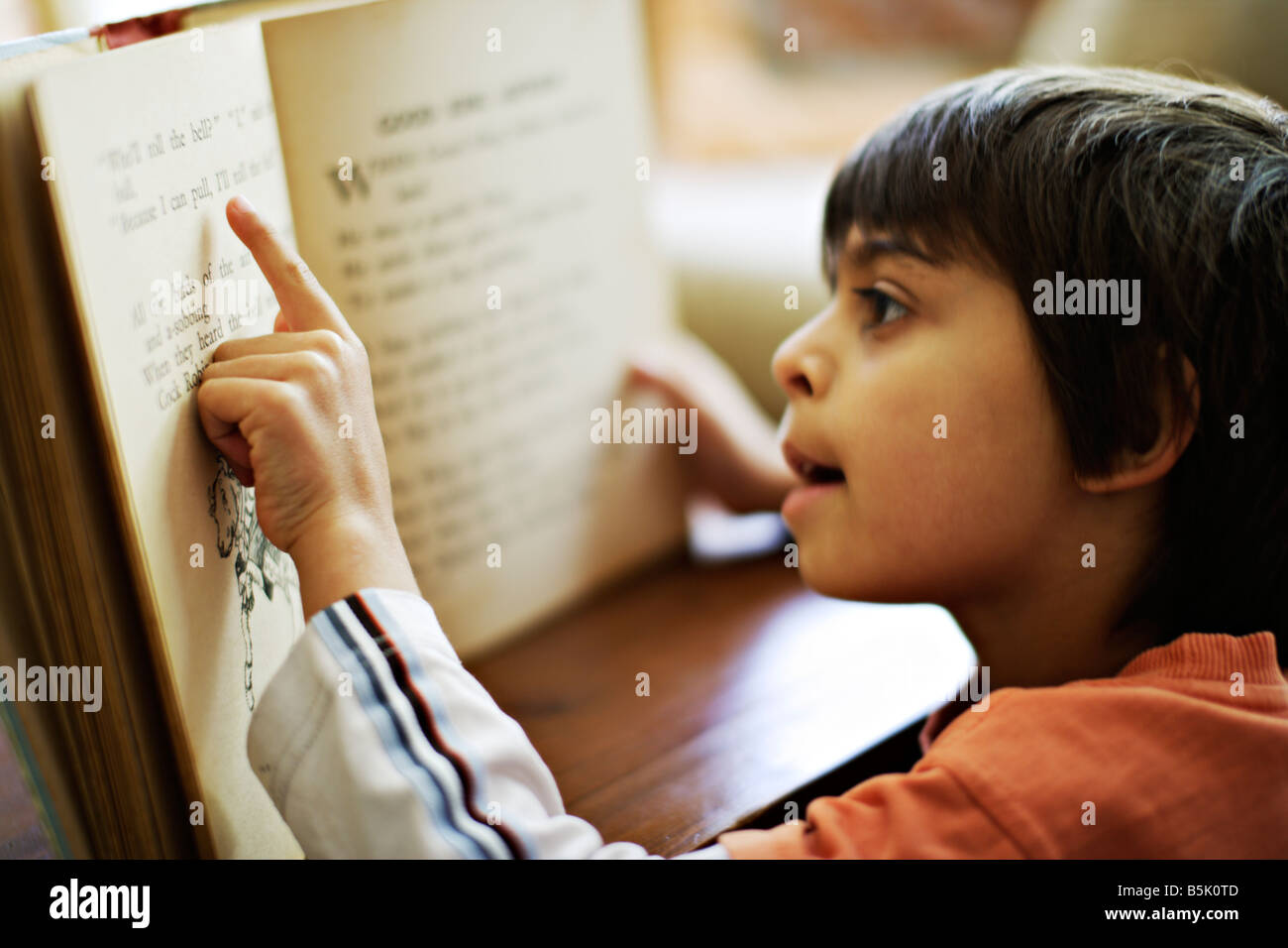 Six year old child reading hi-res stock photography and images - Alamy