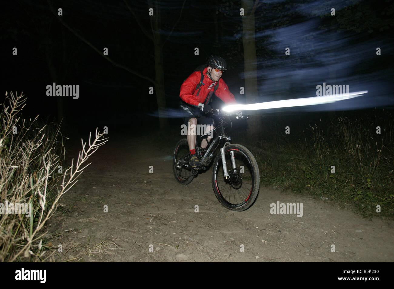 Riding Bike At Night High Resolution Stock Photography and Images - Alamy