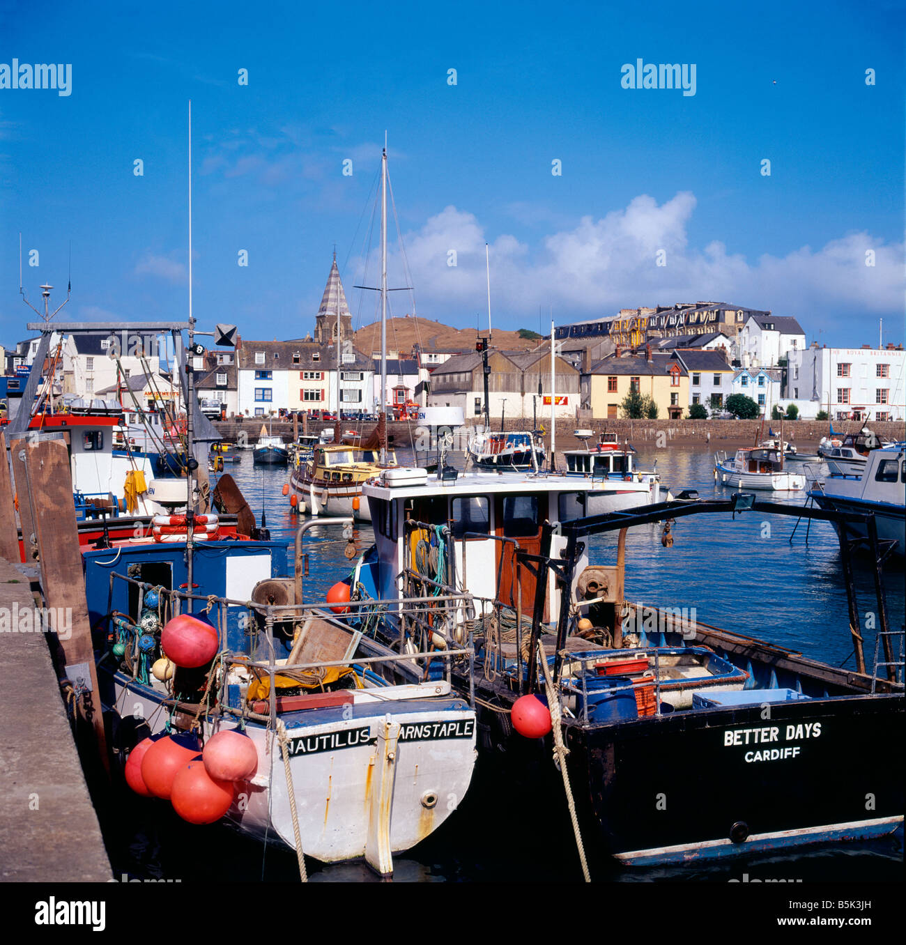 Harbour scene with fishing boats Stock Photo - Alamy