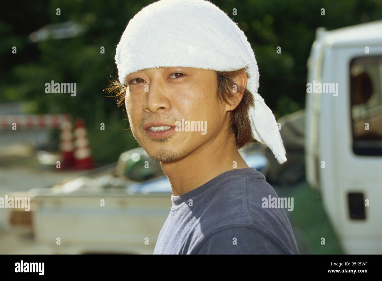 Portrait of a young Japanese carpenter Stock Photo - Alamy