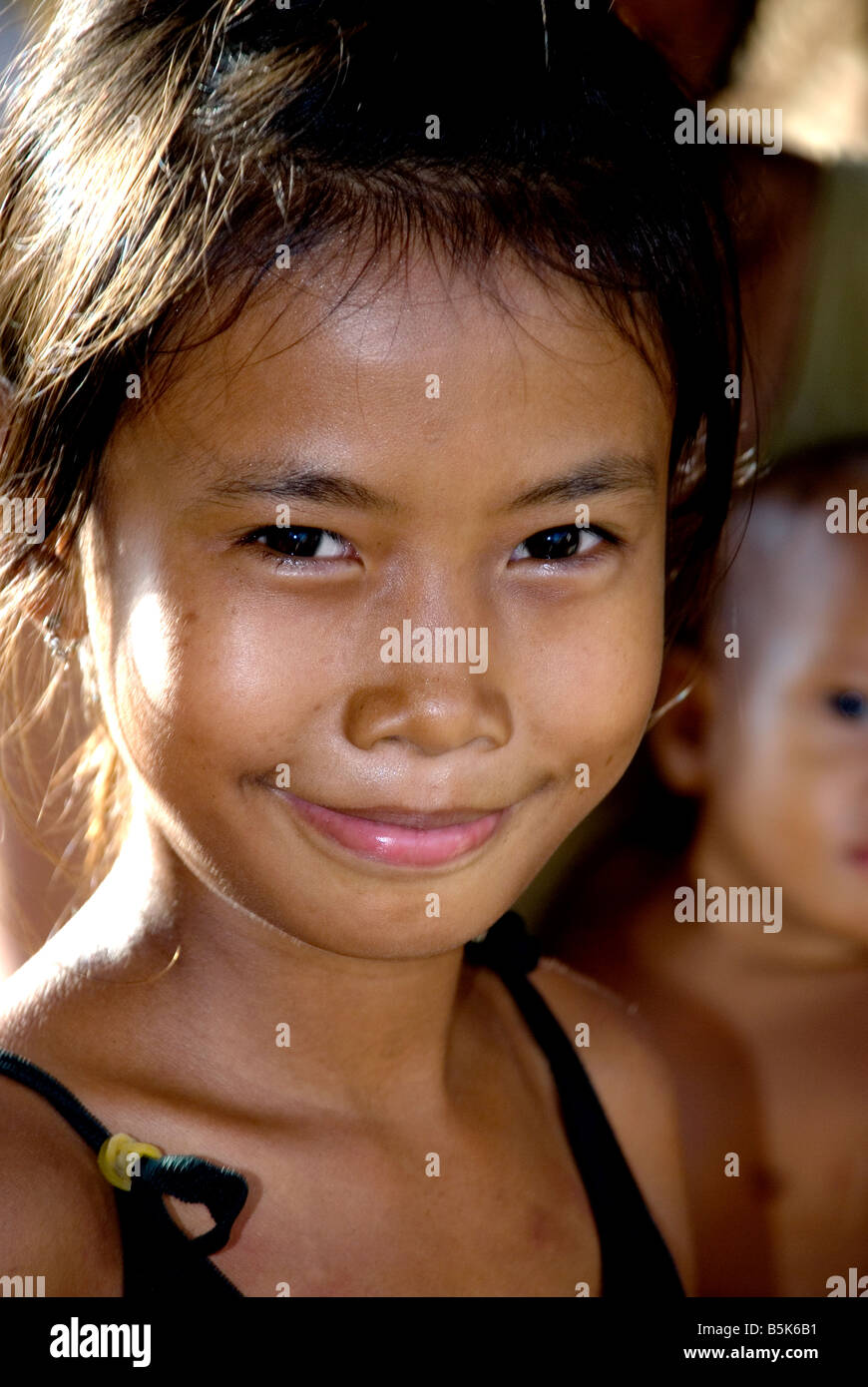 Cambodia Kompong Chhnang children by riverfront Stock Photo - Alamy